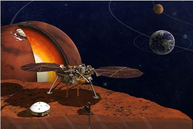Safely on Mars, InSight unfolds its arrays and snaps some pictures ...