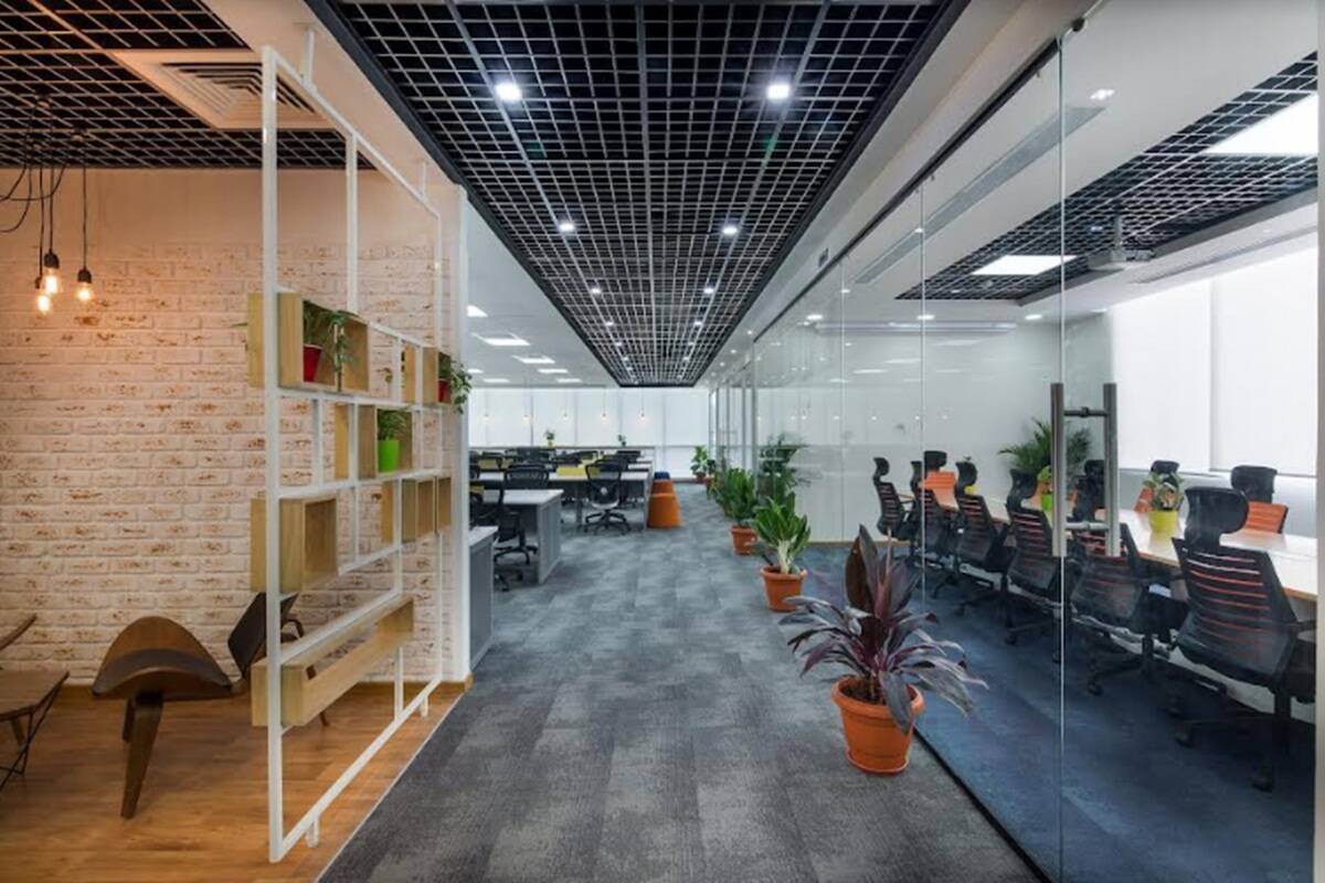 Large companies check into flexible co-working spaces to cut costs ...
