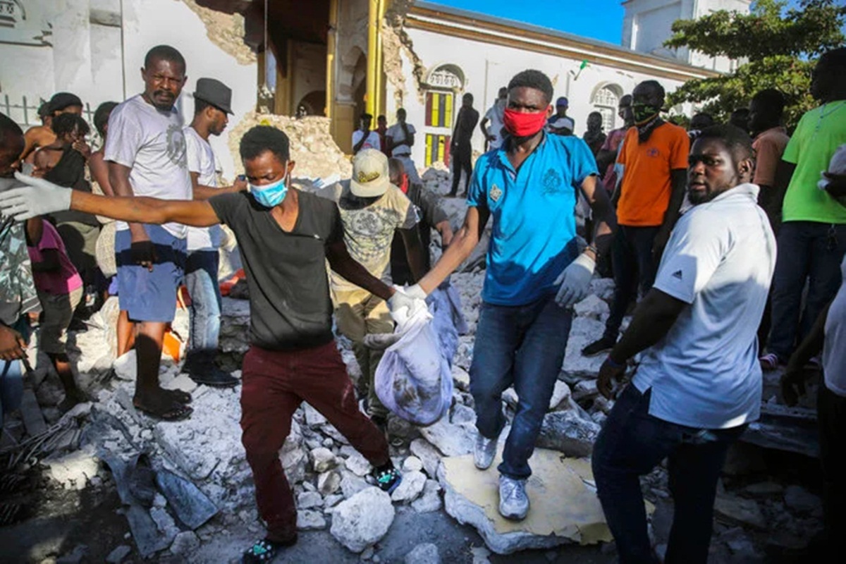 Death toll of powerful earthquake in Haiti soars to 1,297 - World News ...