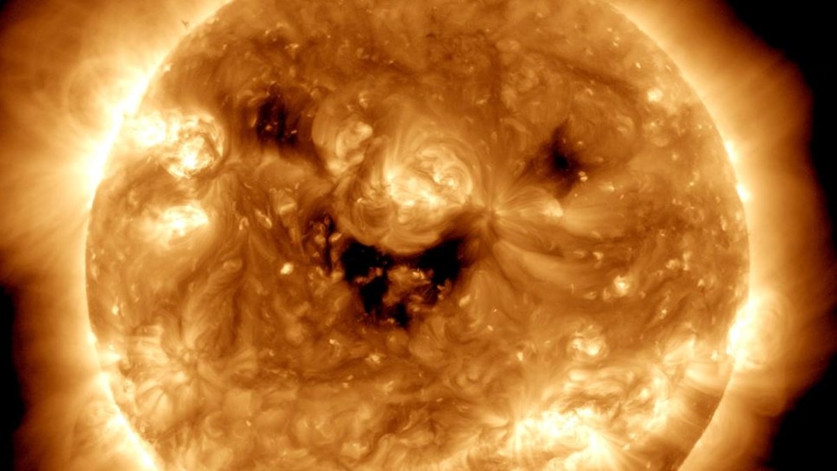 Say cheese! The Sun is ‘smiling’ in NASA’s latest pic - Science News ...
