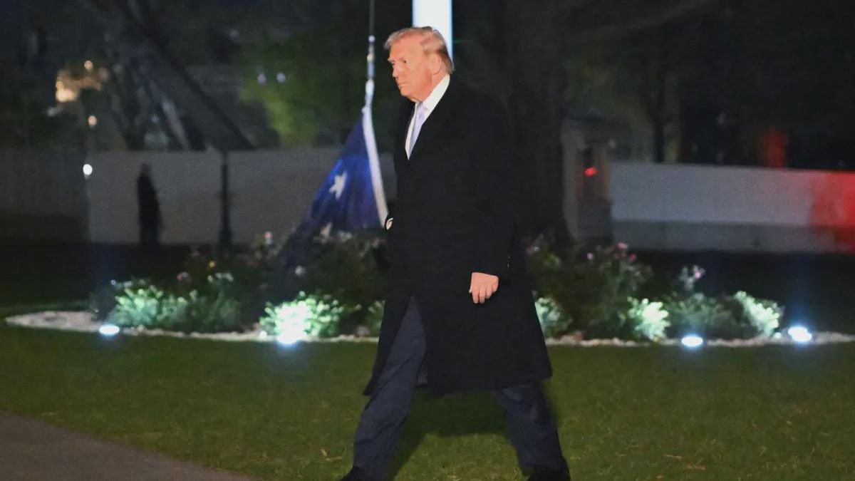Are you even a president?’ Trump slammed over photo walking past fallen ...
